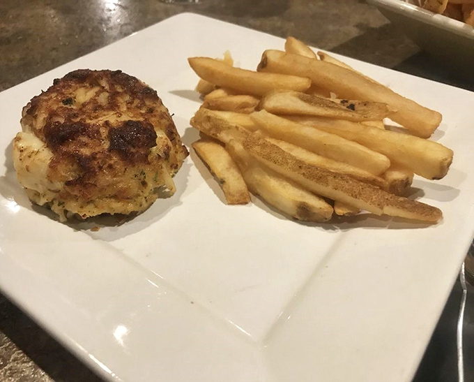 Maryland's unofficial state treasure: a golden-brown crab cake that's almost entirely crab, with just enough binding to keep the deliciousness together.