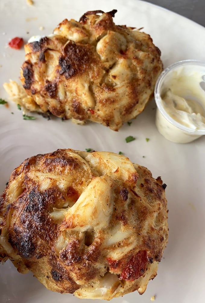 Crab cakes that are actually crab, not breadcrumbs with a seafood rumor. The golden crust practically begs for its close-up.