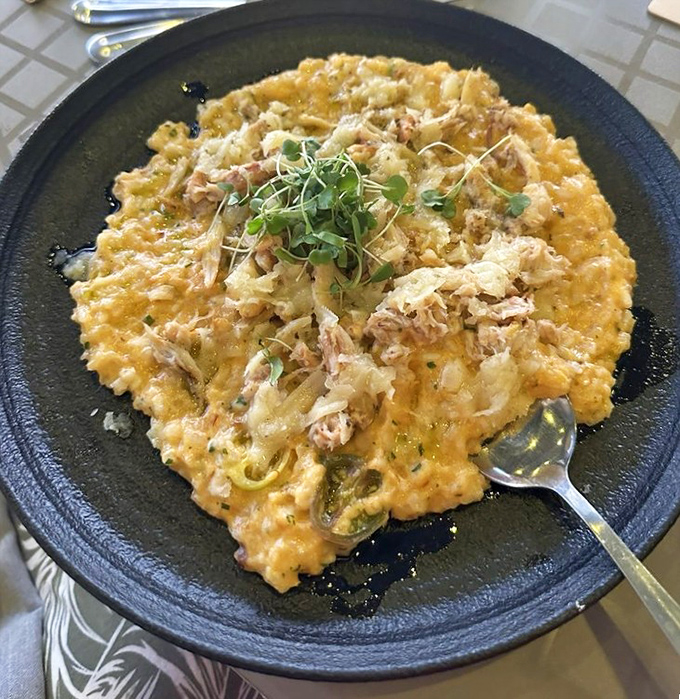 Crab risotto that's worth breaking your "no carbs at the beach" rule. Creamy, decadent, and topped with enough crab to make a seagull jealous.