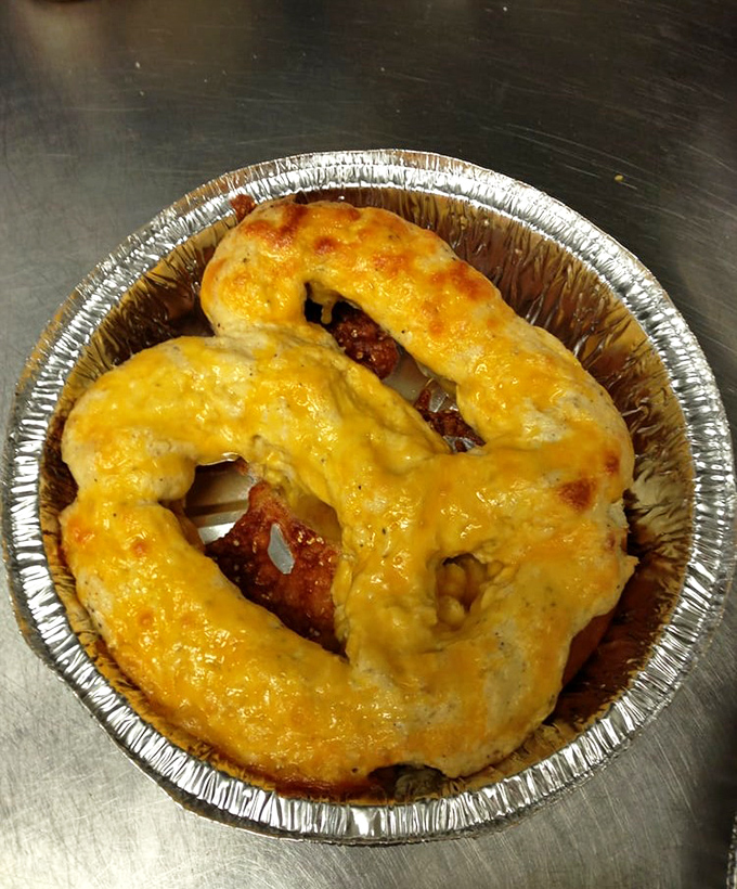 A crab pretzel that looks like it escaped from a Chesapeake Bay fever dream &ndash; gloriously cheesy.
