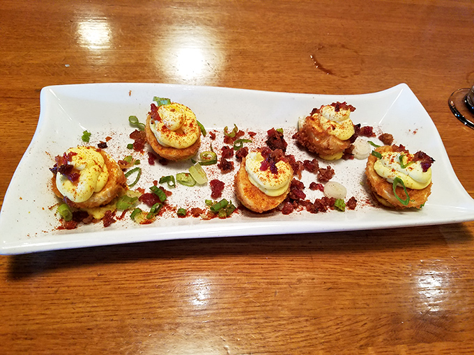 Deviled eggs got dressed up for a night on the town, trading grandma's paprika for crispy coatings and fancy toppings &ndash; retro comfort food with a PhD.