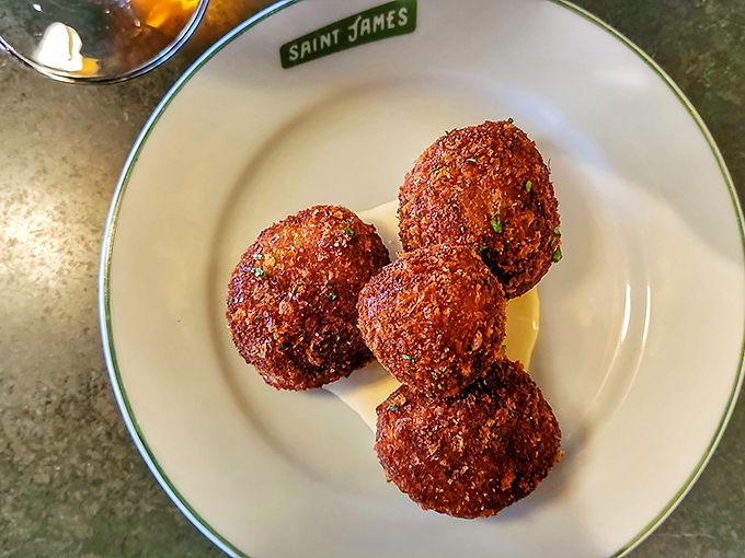These golden-brown croquettes aren't just appetizers; they're little spheres of joy that make you wonder why you ever wasted time on lesser starters.
