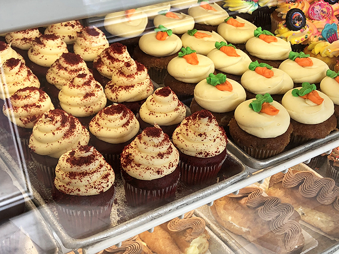 Red velvet cupcakes with perfect swirls of cream cheese frosting alongside carrot cake minis&mdash;these aren't just desserts, they're edible time machines to childhood.