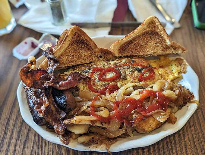 Breakfast architecture at its finest &ndash; crispy bacon, perfectly cooked eggs, and hash browns that strike the ideal balance between crisp and tender.