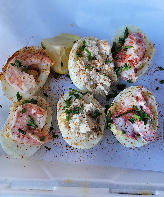 These deviled eggs aren't having an identity crisis&mdash;they've confidently embraced their seafood destiny with lobster, crab, and shrimp toppings.