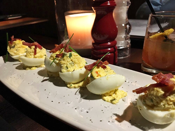 Deviled eggs elevated to art form &ndash; these aren't your aunt's potluck contribution, though she'd certainly approve of the bacon garnish.