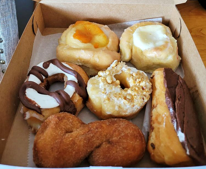 A rainbow of glazed perfection that would make Homer Simpson weep tears of pure joy.