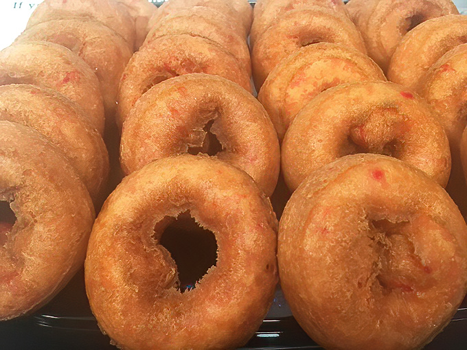 These donuts aren't just having a good day, they're having the time of their lives—golden, perfectly fried, and ready to make your morning magical.