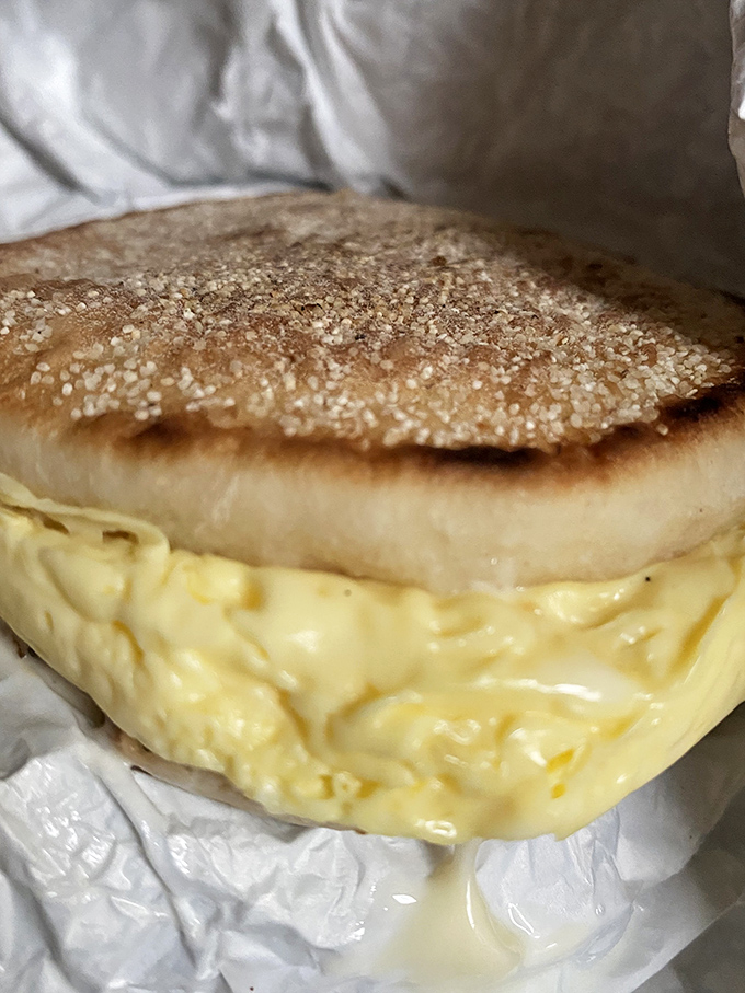 Behold the sandwich that launched a thousand morning commutes &ndash; a pillowy English muffin embracing melted cheese and egg with dignified simplicity.