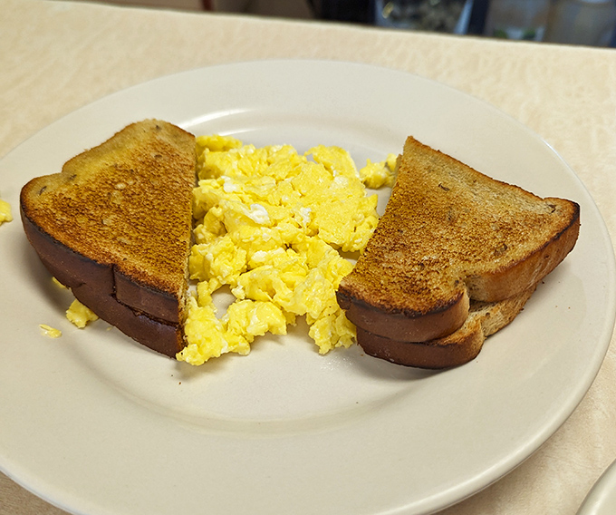 Golden-edged toast and sunshine-yellow eggs&mdash;breakfast fundamentals executed with the precision of a culinary symphony.