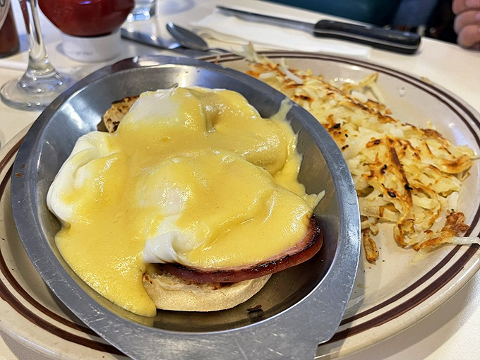 Eggs Benedict that would make the Pope jealous. That hollandaise sauce cascading down like a yellow waterfall of happiness.