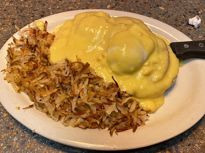 Home fries crisped to golden perfection alongside eggs draped in hollandaise&mdash;a breakfast that makes morning people out of night owls.