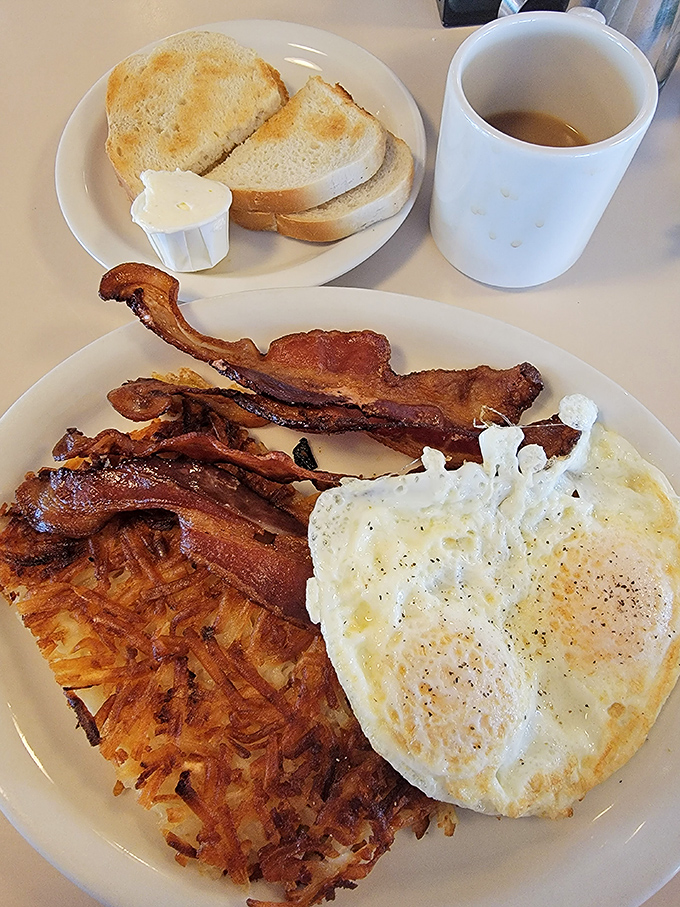 Sunny-side up eggs, perfectly crisped bacon, and hash browns that crackle with each forkful&mdash;breakfast's holy trinity.