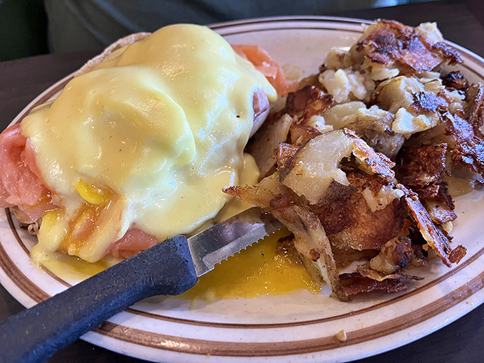 Eggs Benedict: where hollandaise sauce flows like liquid gold over Canadian bacon and English muffins in perfect breakfast harmony.