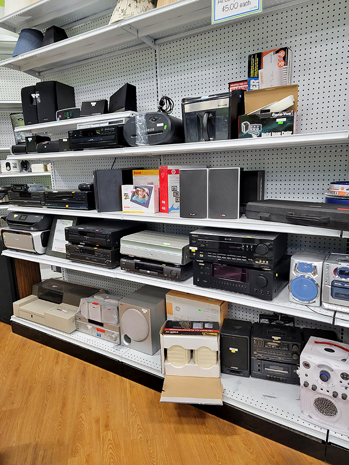 The electronics section: where vintage stereo equipment and modern gadgets coexist like a technological family reunion spanning decades.