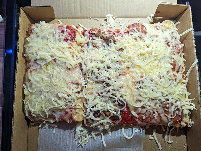 The uncooked pizza awaits its transformation &ndash; like watching Superman before he enters the phone booth, you know greatness is just minutes away.