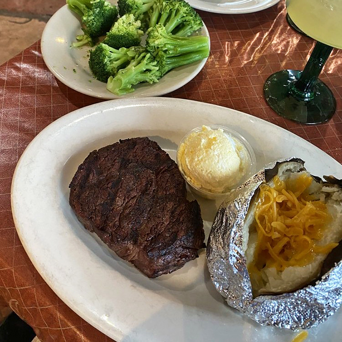 The filet mignon arrives like a distinguished gentleman&mdash;perfectly dressed in a char tuxedo with a baked potato sidekick sporting cheesy bling.
