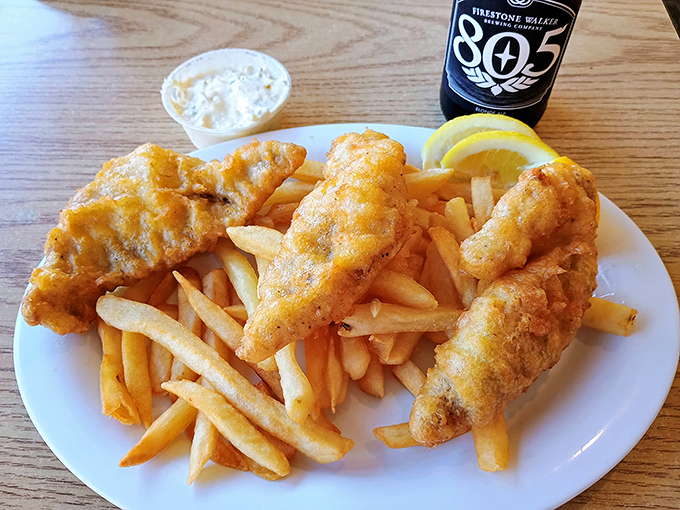 Fish and chips done right&mdash;golden-battered cod with a crunch that echoes across the Pacific, alongside fries that demand to be noticed.
