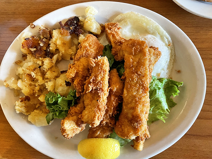 Crispy catfish that would make any Southern grandmother nod in approval, paired with eggs and golden hash browns.