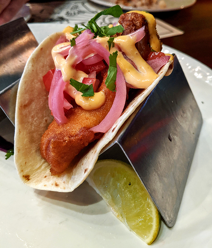 Not your average fish taco&mdash;this is the overachiever of the taco world. Crispy fish, vibrant pickled onions, and that sauce that ties it all together.
