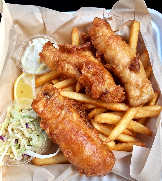 Beer-battered fish so crisp it practically shatters, paired with fries that deserve their own fan club. The coleslaw prevents scurvy&mdash;how thoughtful!