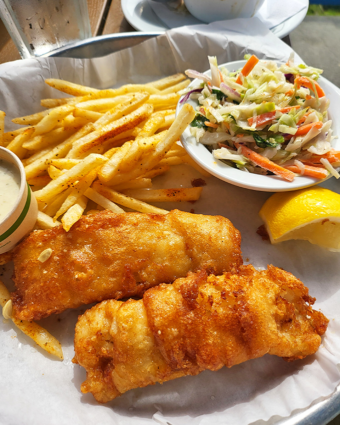 Fish and chips that would make a British pub jealous – golden, crispy perfection with fries that demand to be savored.