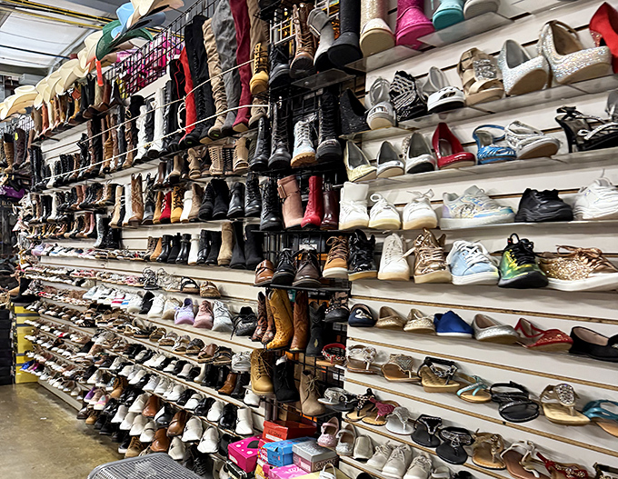 Footwear fantasyland! Every style, size, and color imaginable lines these walls, proving that Cinderella could have saved herself a lot of trouble here.