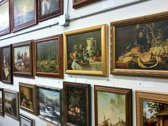 A wall of frames ready to hold your memories, or perhaps finally give that yard sale painting the respect it deserves.