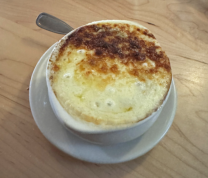 French Onion Soup with that golden, bubbling crown of cheese &ndash; comfort food that's dressed for a fancy night out.