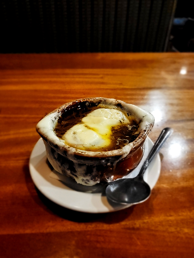 French onion soup that's achieved the perfect cheese-to-broth ratio—a bubbling cauldron of comfort that's worth the inevitable string of cheese on your chin.