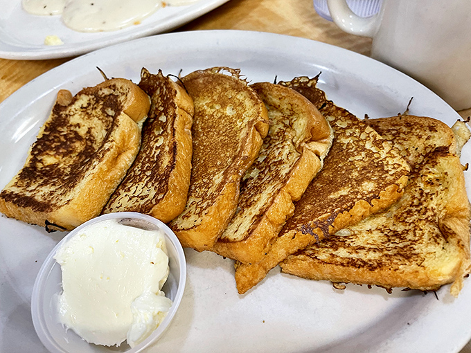 French toast that makes you understand why breakfast deserves its "most important meal" status. That side of butter isn't a suggestion&mdash;it's essential.