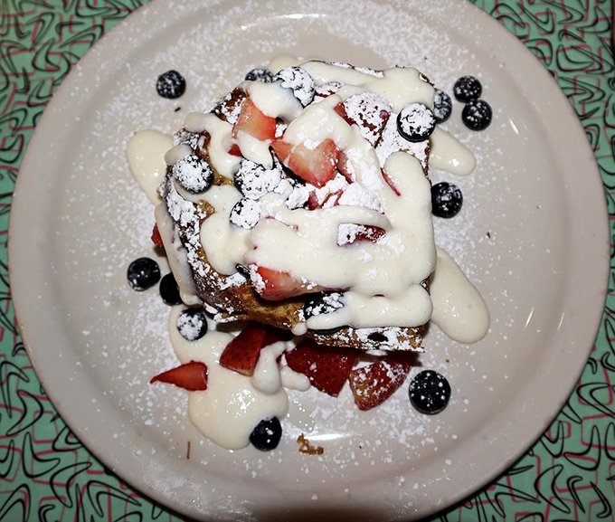This isn't just French toast&mdash;it's a sweet island paradise with berries, cream, and powdered sugar. Breakfast that doubles as dessert is always the right choice.