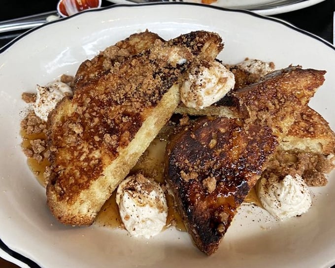 French toast that makes pancakes jealous. The caramelized exterior and pillowy interior create a breakfast symphony worthy of a standing ovation.