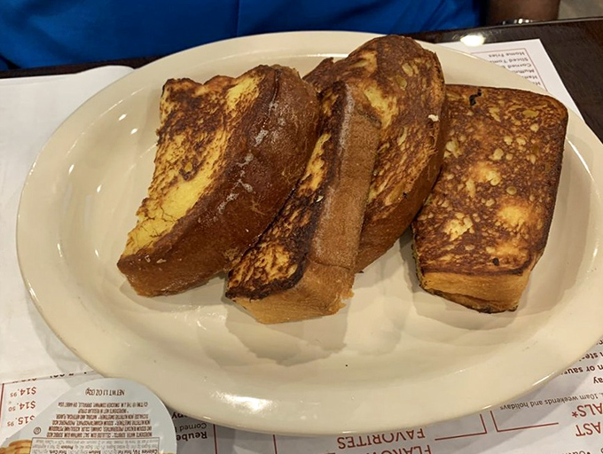 Challah French toast that makes ordinary breakfast feel like amateur hour&mdash;crispy edges, custardy center, and enough deliciousness to make you contemplate breakfast for dinner. 