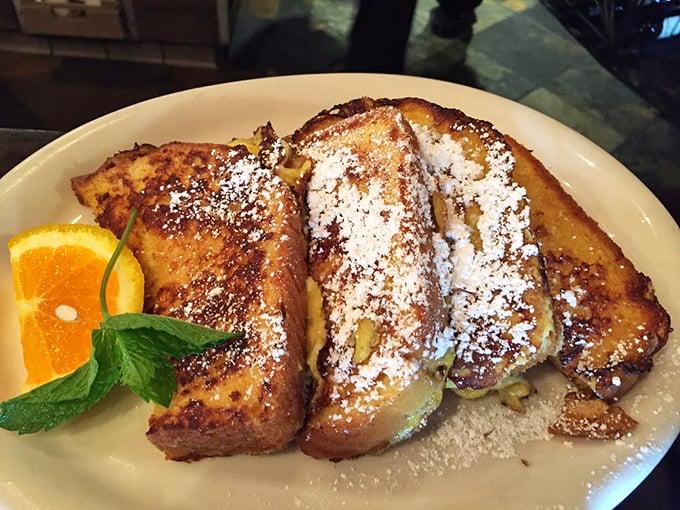 French toast that makes you question every other breakfast decision you've ever made. That dusting of powdered sugar? Pure morning magic.