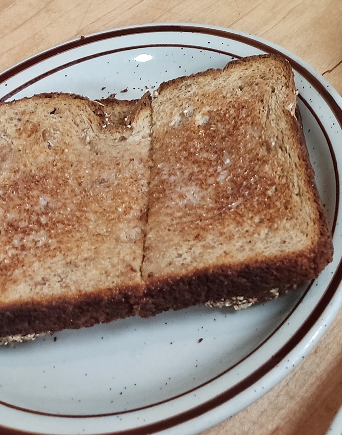 Toast so perfectly golden it belongs in Fort Knox. This isn't just bread that met heat&mdash;it's a transformation worthy of a breakfast fairy tale.