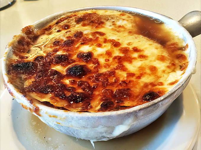 This French onion soup isn't messing around. That cheese pull could win Olympic medals for both distance and artistic impression.