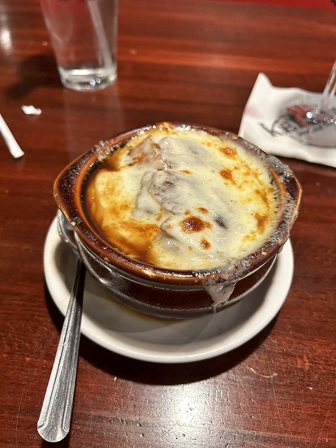French onion soup done right - bubbling cheese, rich broth, and enough comfort to warm even the coldest Hoosier winter.