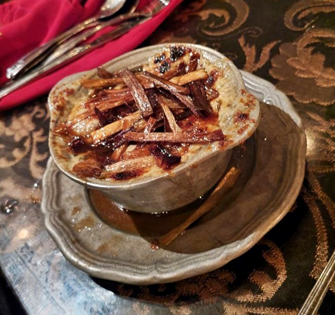 French onion soup gets the royal treatment with that gorgeous lattice of melted cheese.