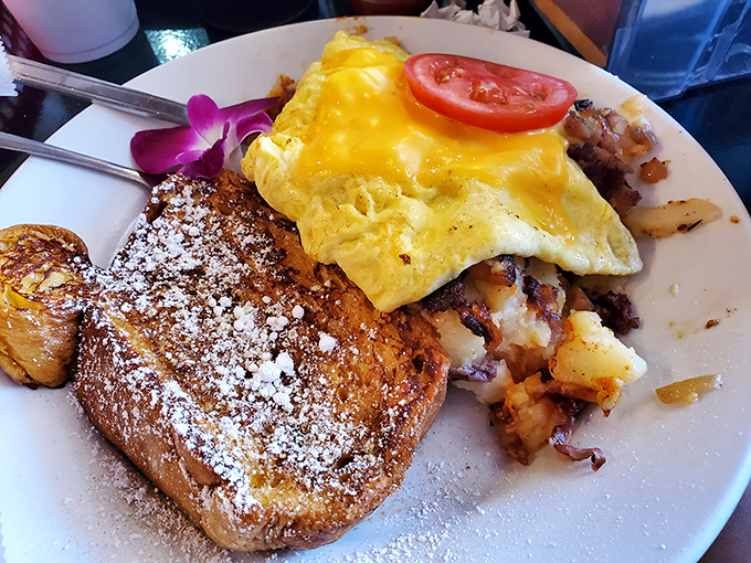 French toast and eggs living their best life together on one plate&mdash;the breakfast equivalent of finding both a parking spot AND a short line.