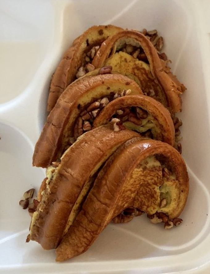 Croissant French toast with pecans&mdash;proof that someone in this kitchen understands the architecture of breakfast pleasure. The crispy edges deserve their own fan club.
