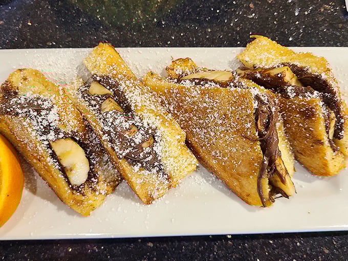 French toast stuffed with what appears to be Nutella and bananas&mdash;proof that breakfast can double as therapy. No appointment necessary.