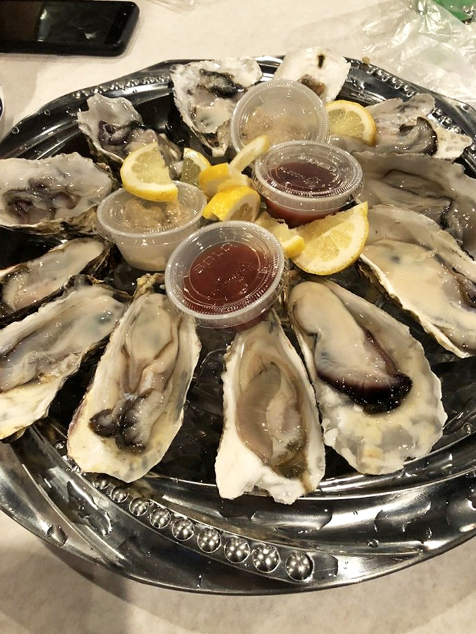 Fresh oysters arranged like nature's jewelry box. Add a squeeze of lemon and suddenly Tuesday feels like your birthday.