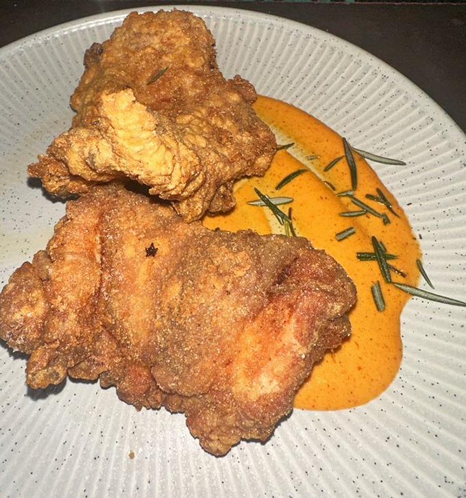 Fried chicken that would make your Southern grandmother weep with joy. Golden, crunchy exterior giving way to juicy perfection underneath.