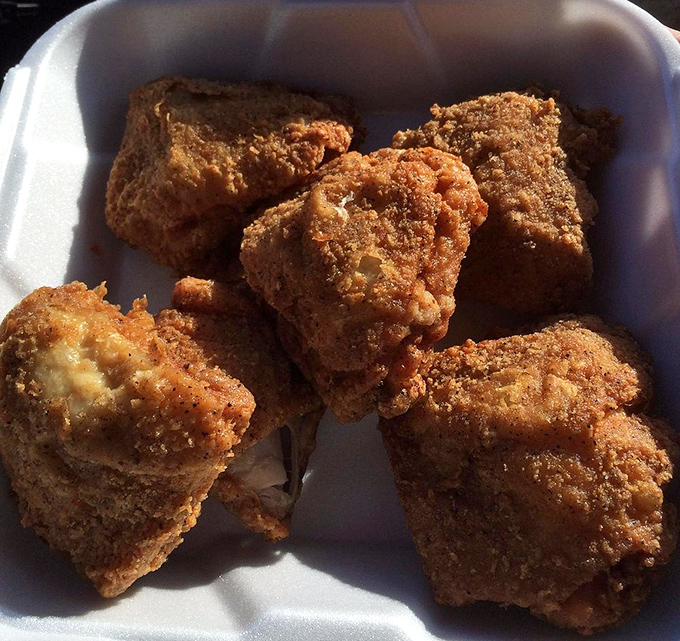 Golden-fried chicken that crackles with each bite. The kind of crispy exterior and juicy interior that would make Colonel Sanders question his life choices.