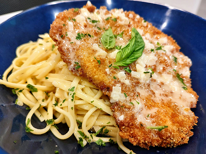 Not all heroes wear capes&mdash;some wear golden breadcrumbs and rest on a bed of pasta. This crispy chicken cutlet deserves its own theme music.