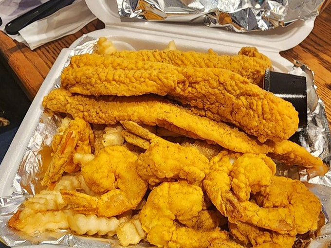 Golden-fried perfection that shatters with each bite. This plate of fried fish and seafood wears its crispy coating like designer fashion&mdash;simple, elegant, and impossible to resist.