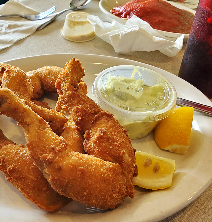 Golden-fried frog legs that would convert even the most skeptical diner. Crispy, tender, and served with a side of "yes, I actually ordered frog legs and loved them."