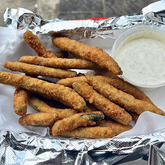 These crispy green bean fries make eating vegetables feel like cheating. Paired with marinara, they're the side dish that steals the spotlight.