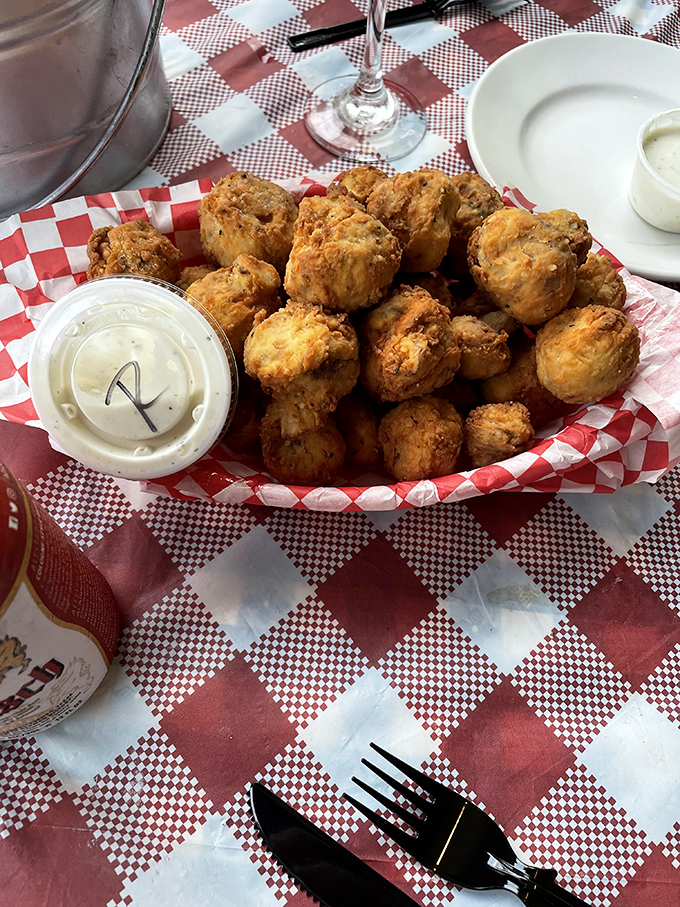 Fried mushrooms that would make even vegetable skeptics reconsider their life choices. Crispy outside, earthy inside—a textural masterpiece worth the drive.